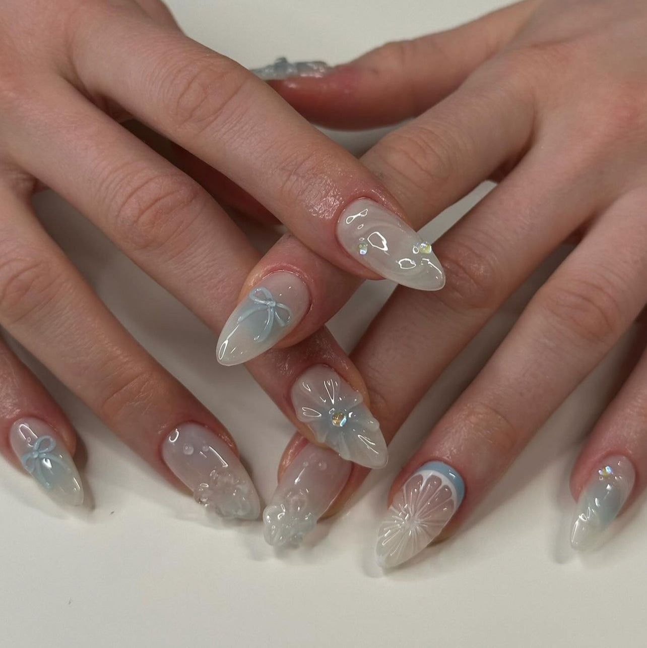 Whimsical Garden Long Almond Cloud Blue and Clear Press On Nail Set wi ...