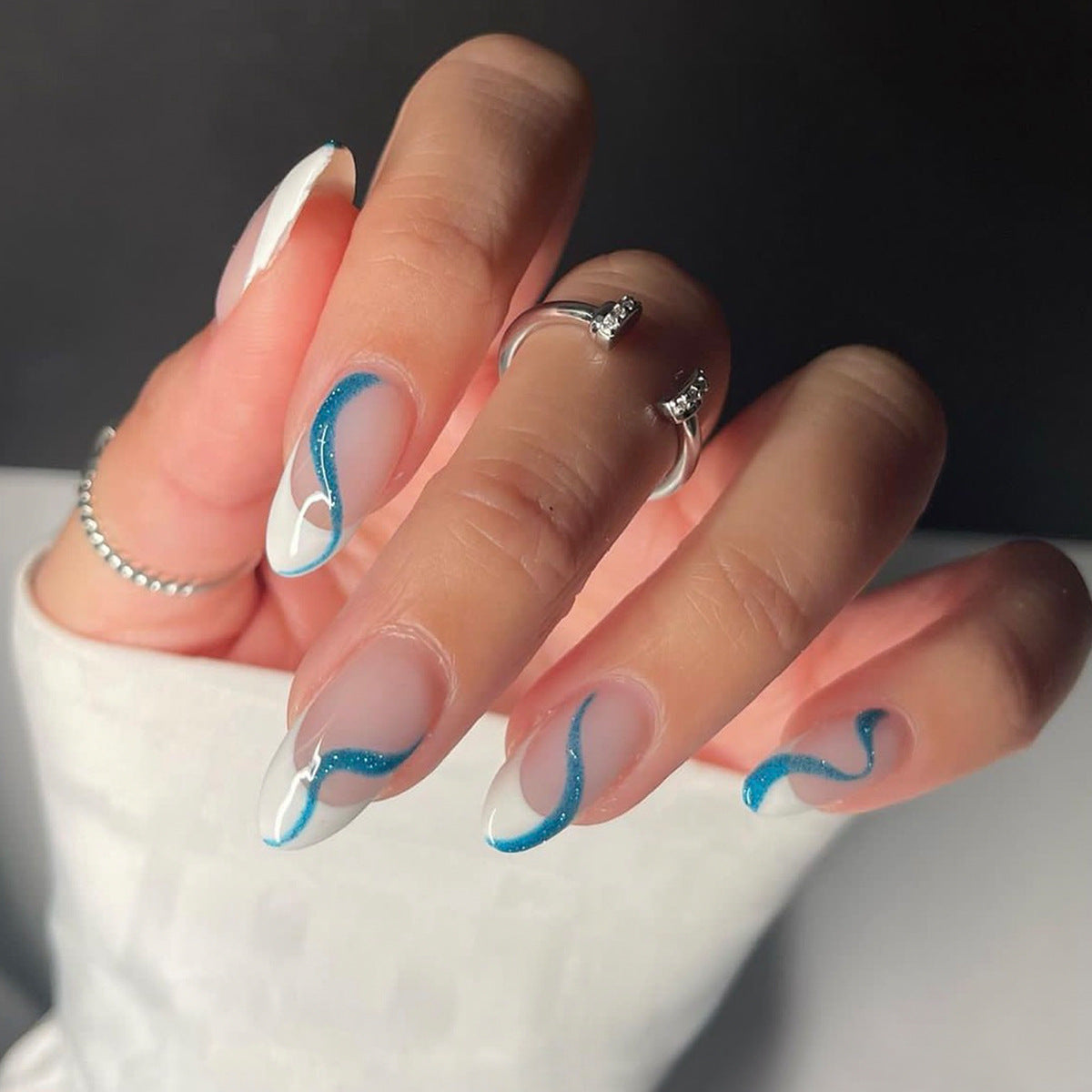 Oceanic Swirl Medium Almond French Tip Press On Nails with Blue Glitte ...